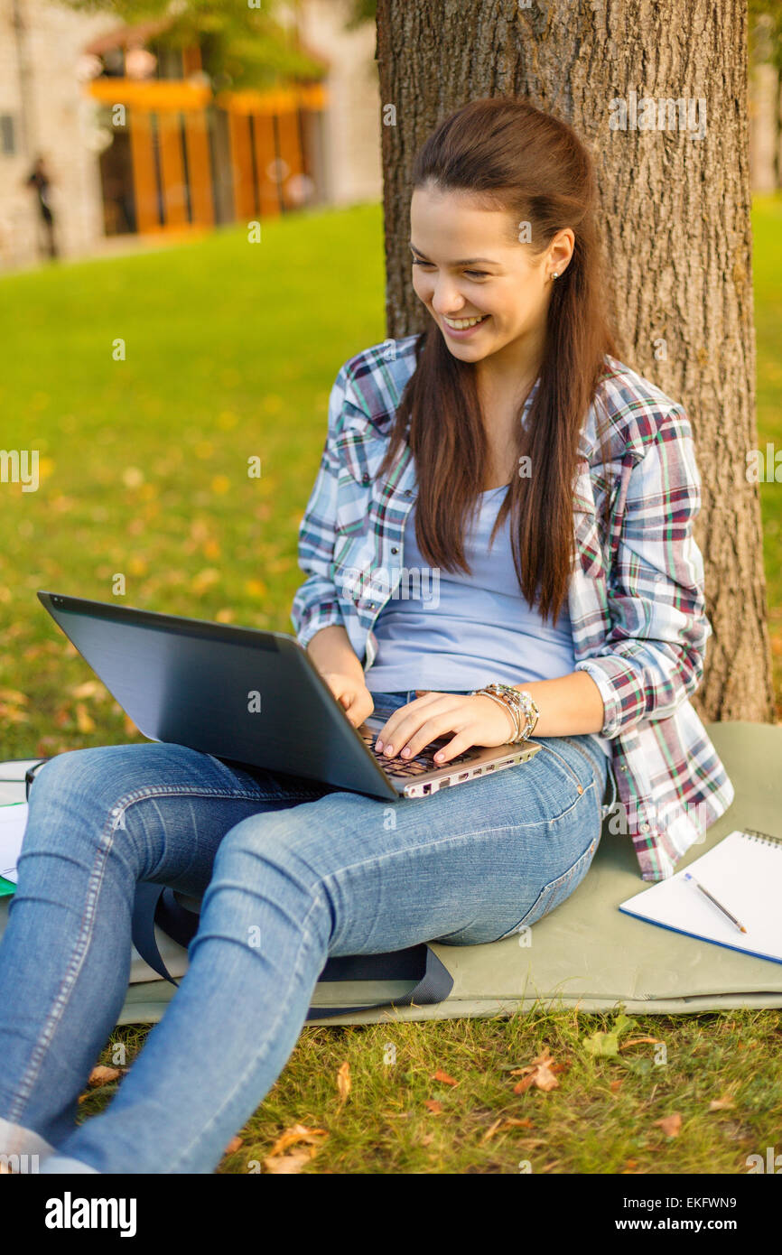 smiling teenager with laptop Stock Photo - Alamy