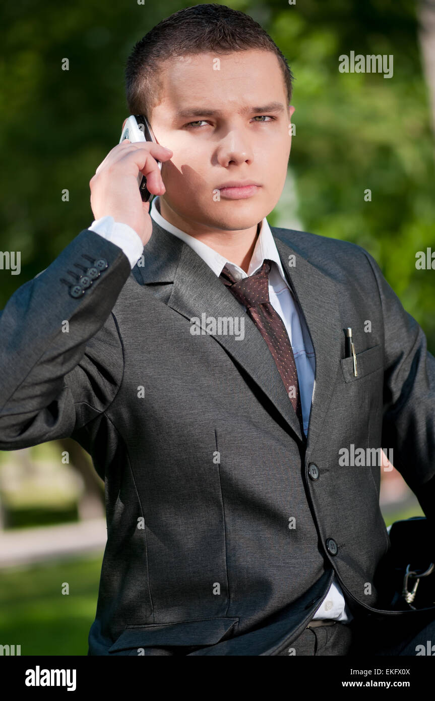 business man talk by mobile phone. Student Stock Photo - Alamy