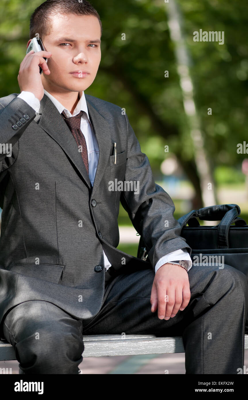 business man talk by mobile phone. Student Stock Photo - Alamy