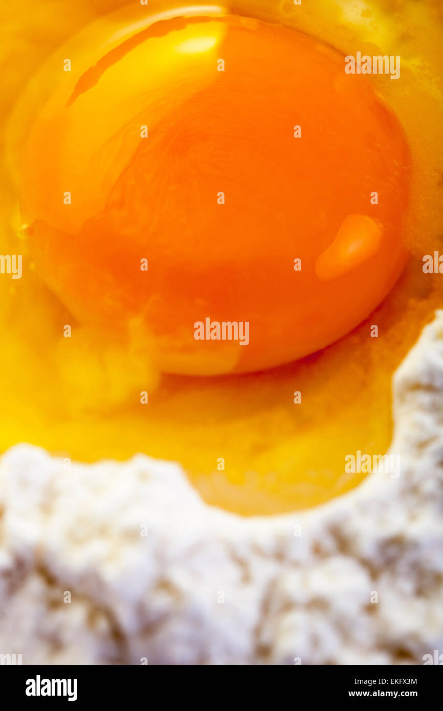 Close Up Of Egg In Flour Stock Photo - Alamy