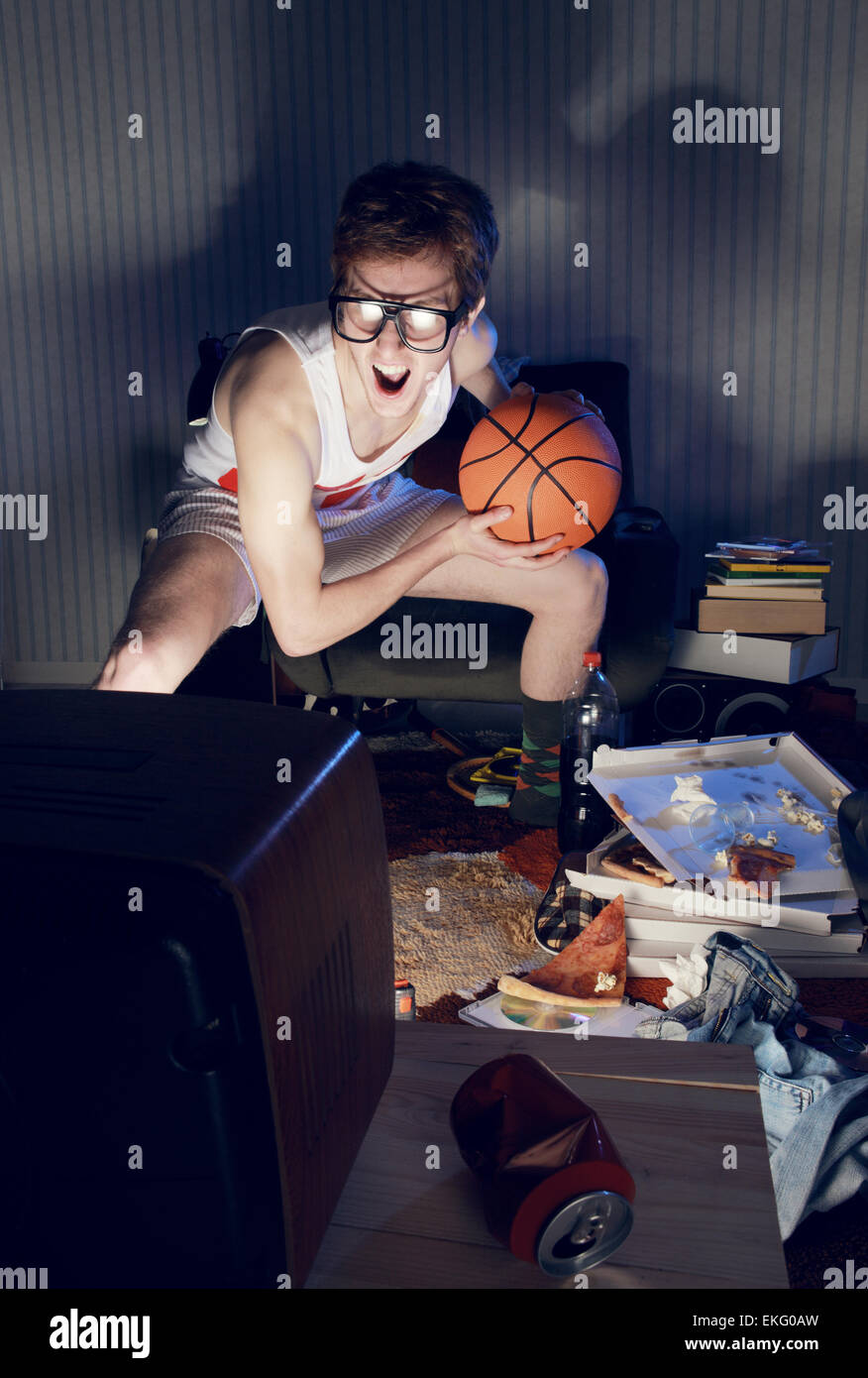 Basketball Fan Watching Television Stock Photo - Alamy
