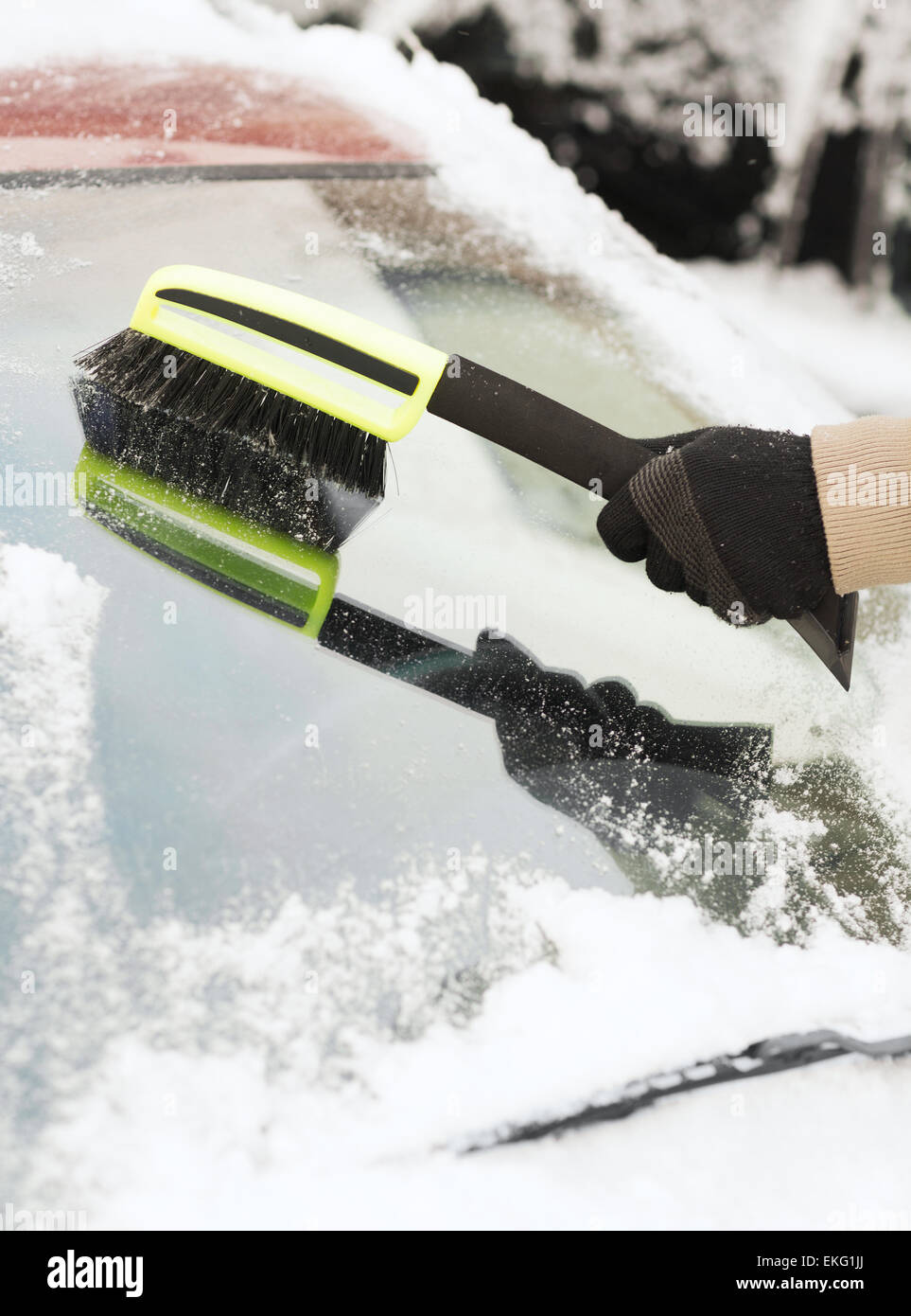 closeup of man cleaning snow from car Stock Photo - Alamy