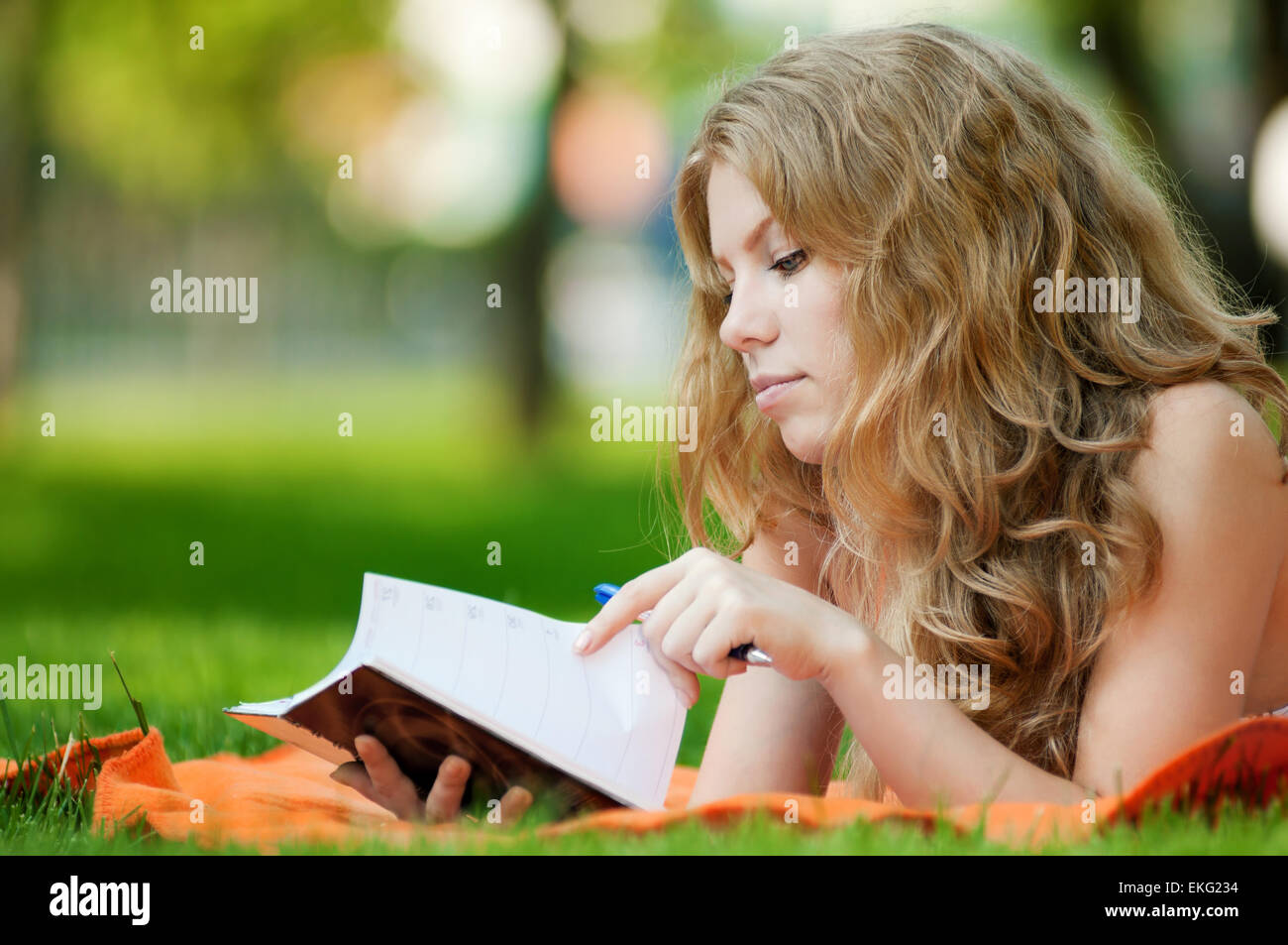 Beautiful young woman study Stock Photo - Alamy