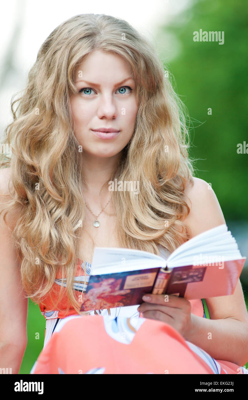 Beautiful young woman read book Stock Photo - Alamy