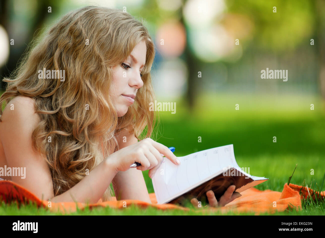 Beautiful young woman study Stock Photo - Alamy