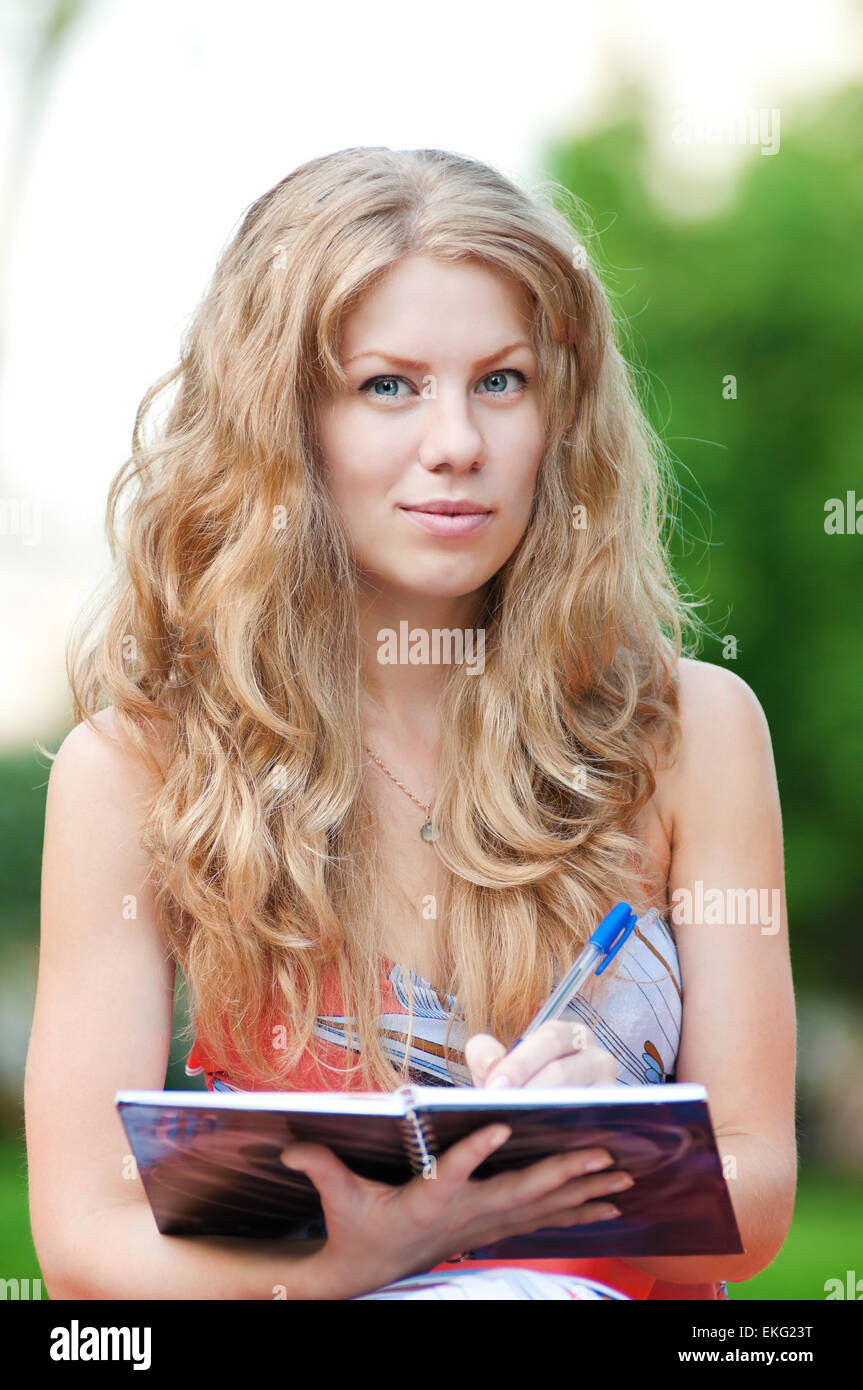 Beautiful young woman study Stock Photo - Alamy