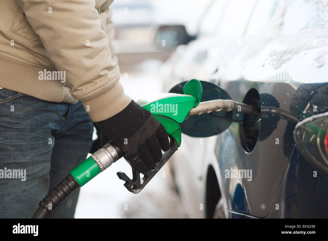close up of male refilling car fuel tank Stock Photo - Alamy