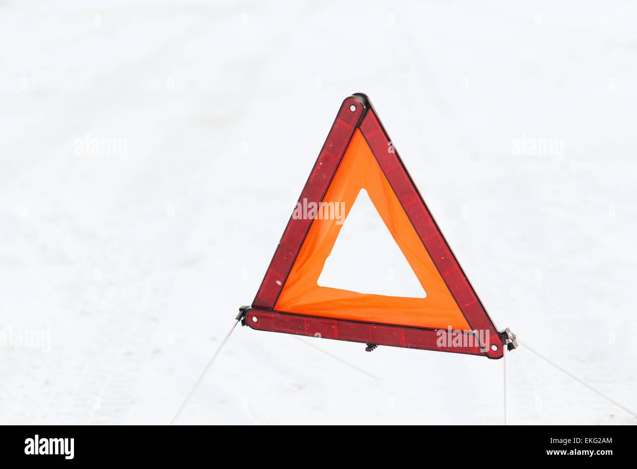 closeup of warning triangle on snow Stock Photo - Alamy