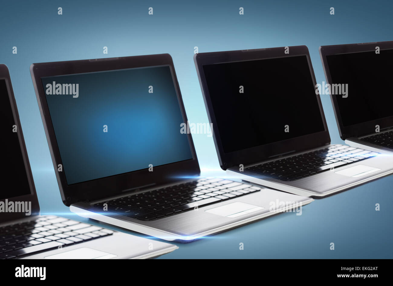 many laptop computers with blank black screens Stock Photo - Alamy