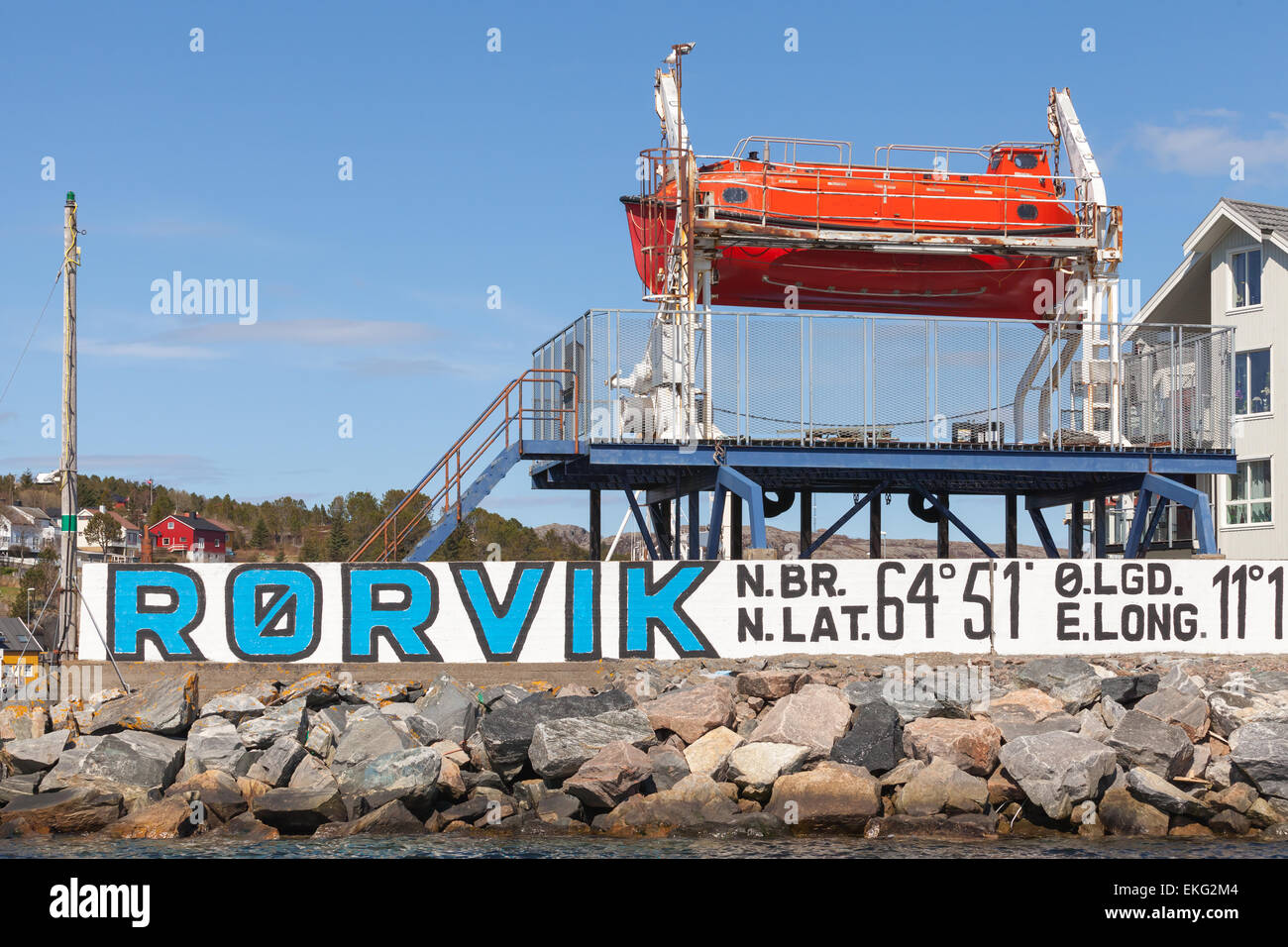 Rorvik, Norway - May 13, 2013: Entrance to bay of Rorvik, red rescue ...