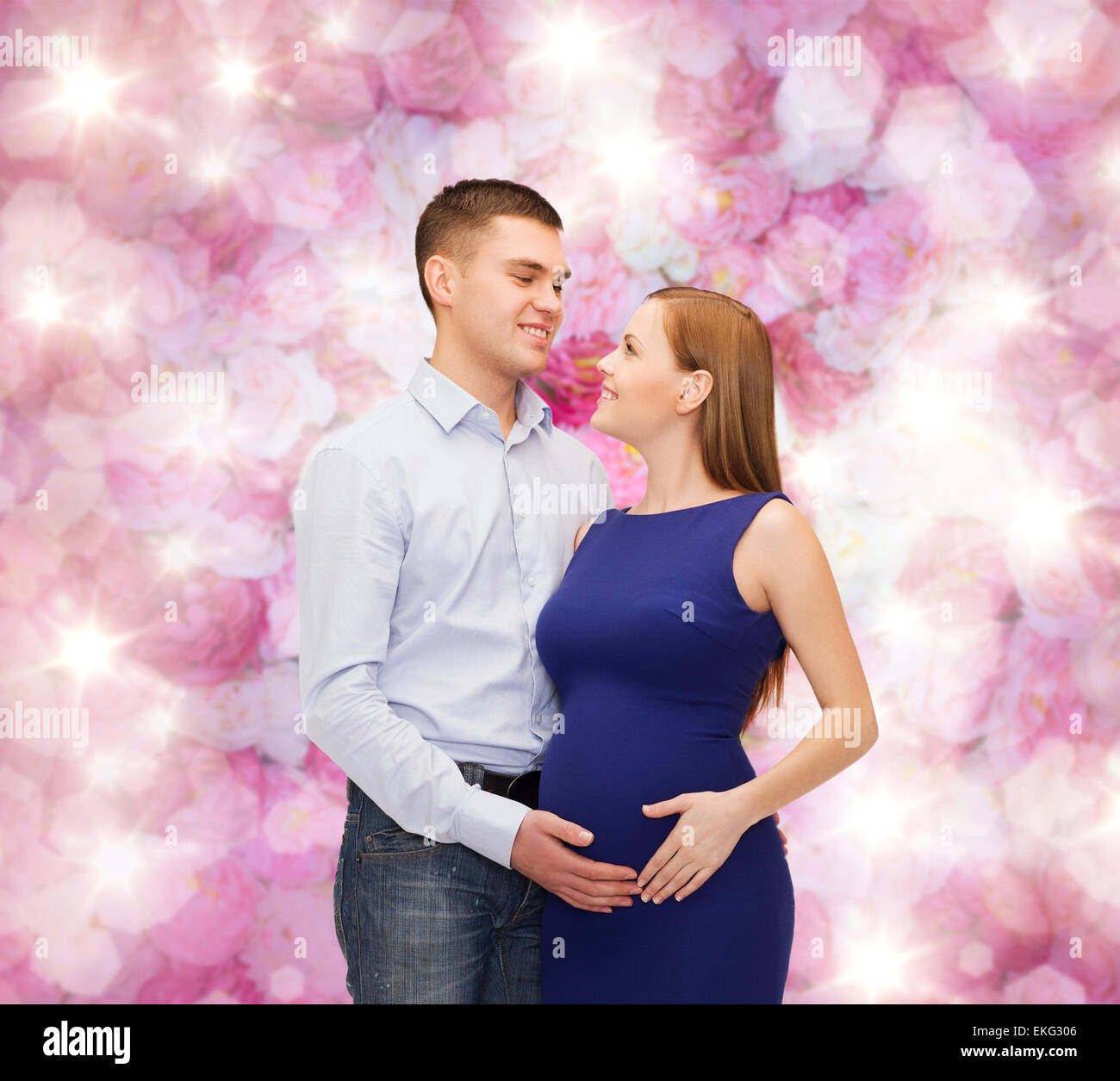 happy young family expecting child Stock Photo - Alamy