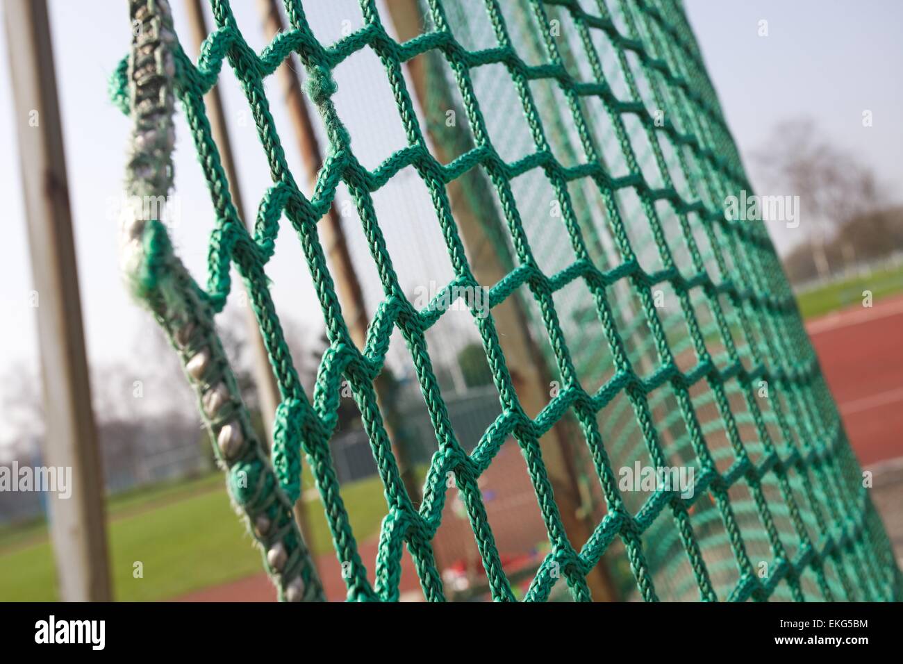 close up shot of green netting on a sports field Stock Photo - Alamy
