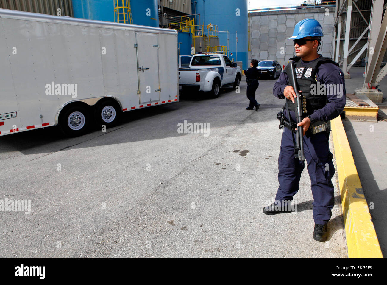 CBP officers stand guard over evidence awaiting disposal. The security ...