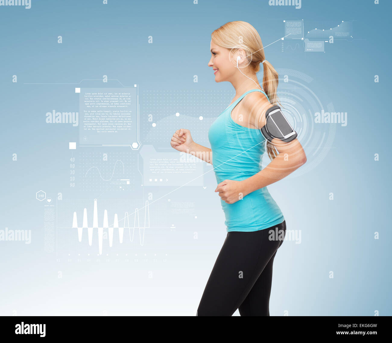sporty woman running with smartphone and earphones Stock Photo - Alamy