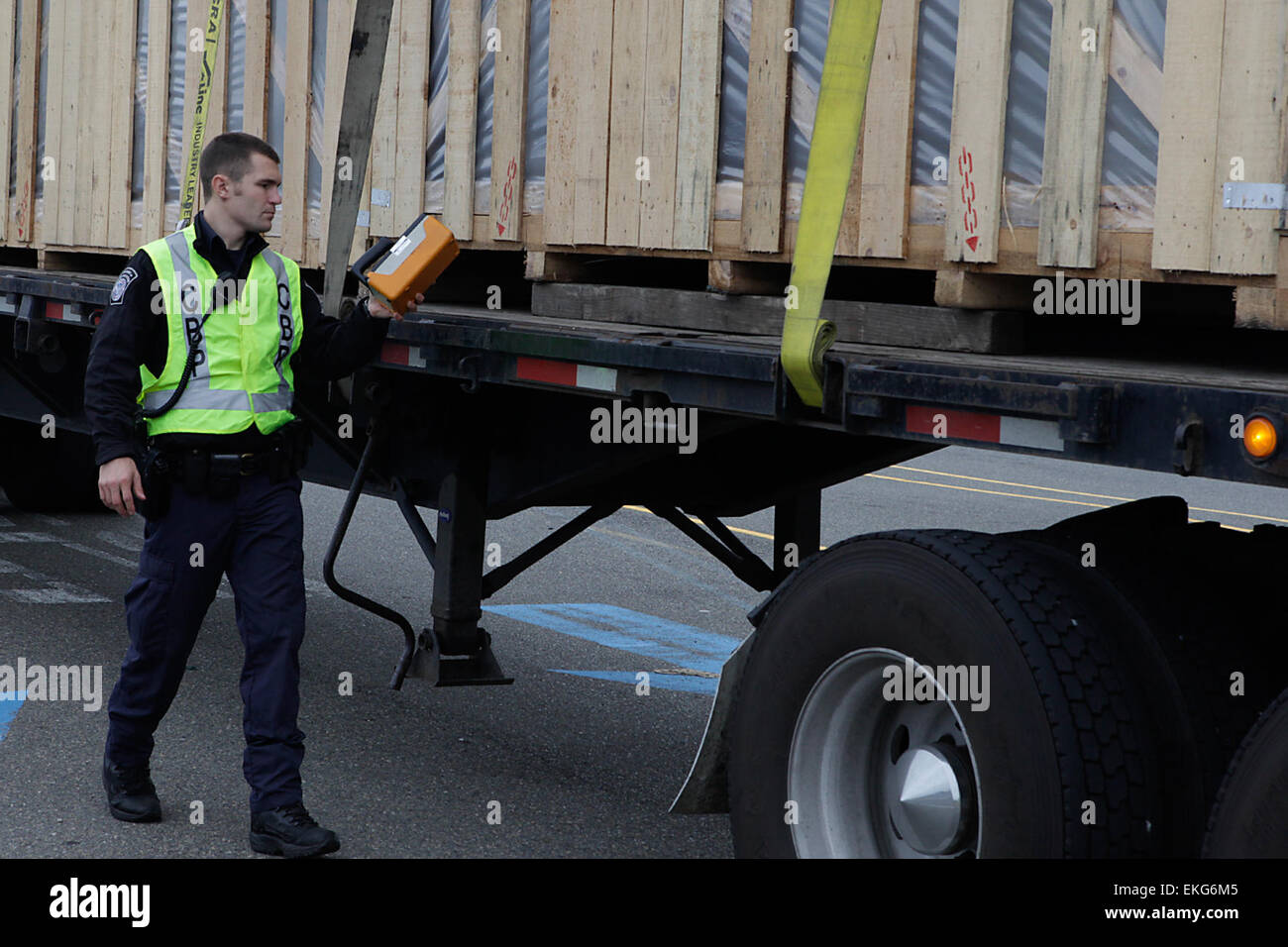 A CBP officer uses a Buster scanner to inspect a vehicle for hidden ...