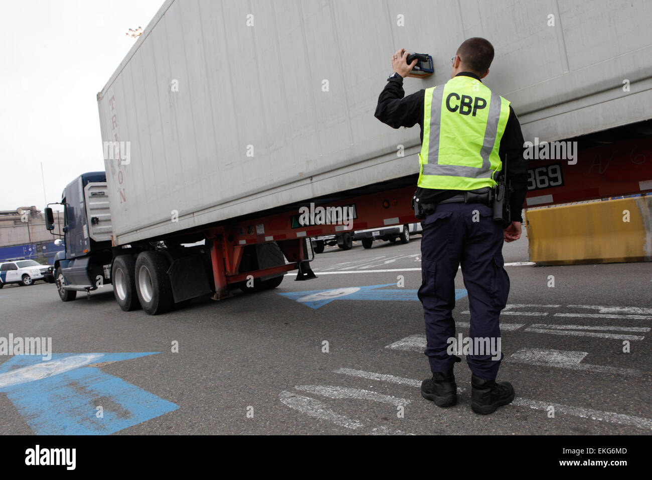 A U.S. Customs and Border Protection Field Officer uses a Buster, a non ...