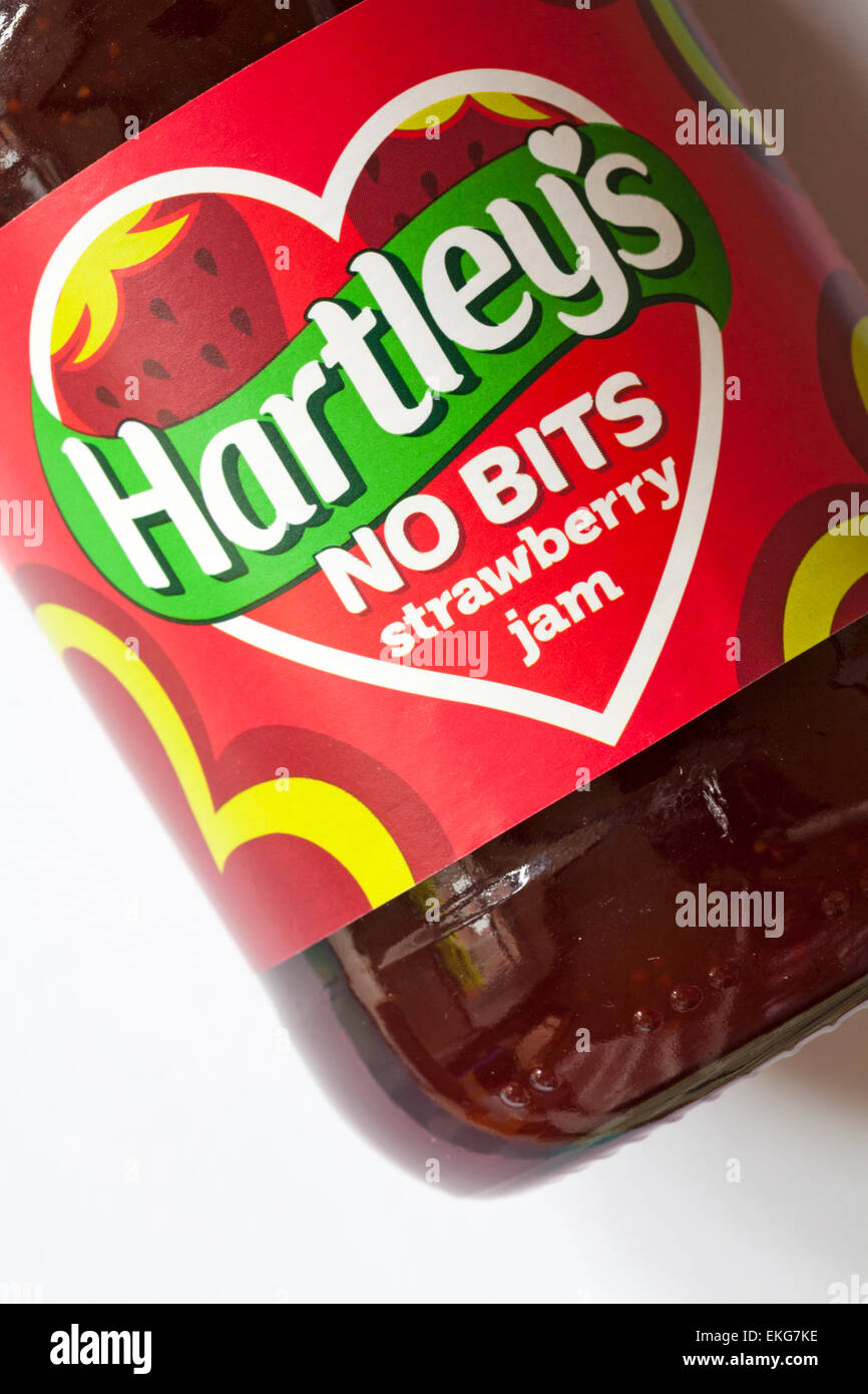Label on jar of Hartley's no bits strawberry jam set on white ...
