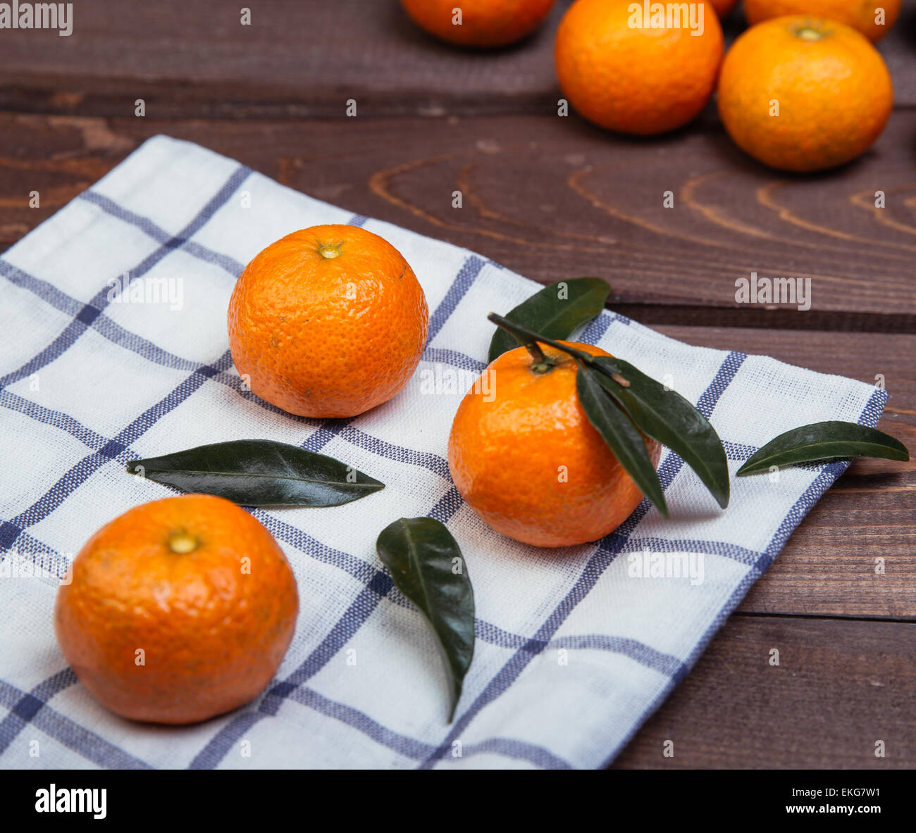 Three tangerines with leaves hi-res stock photography and images - Alamy