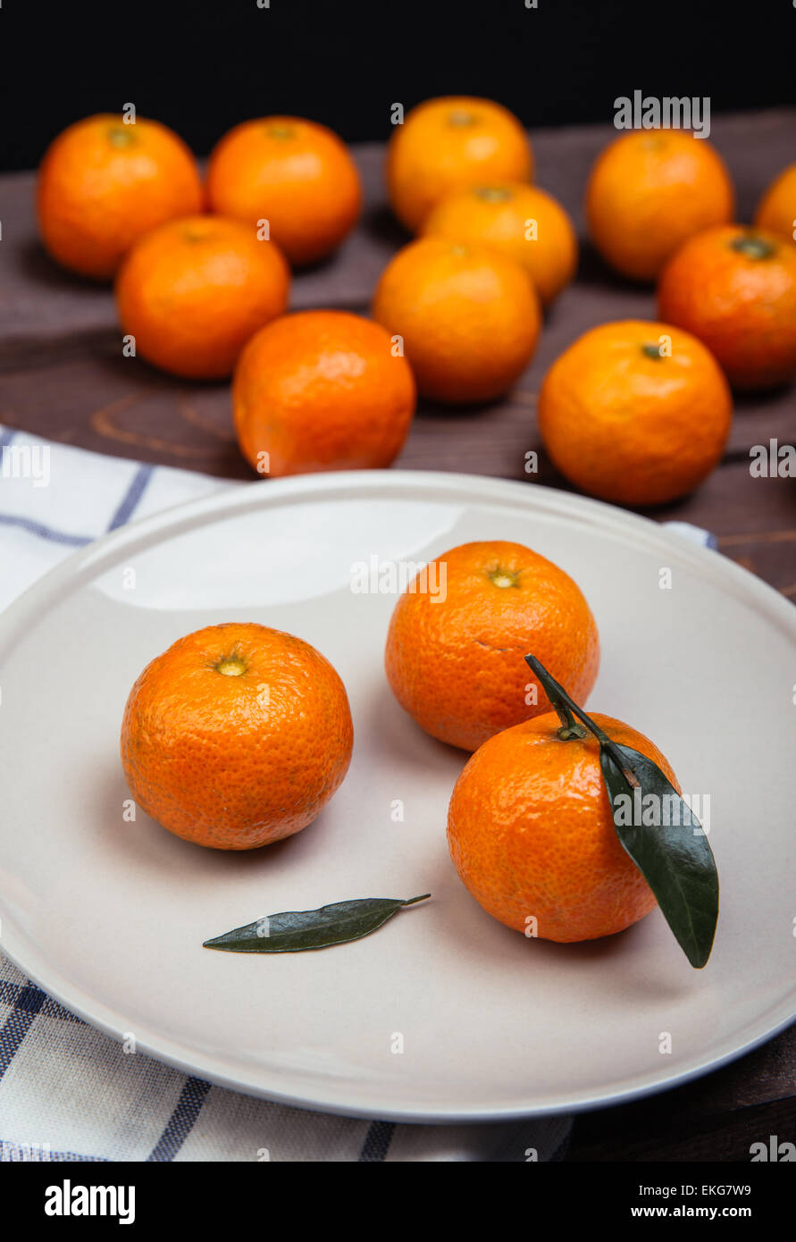 Three tangerines with leaves hi-res stock photography and images - Alamy