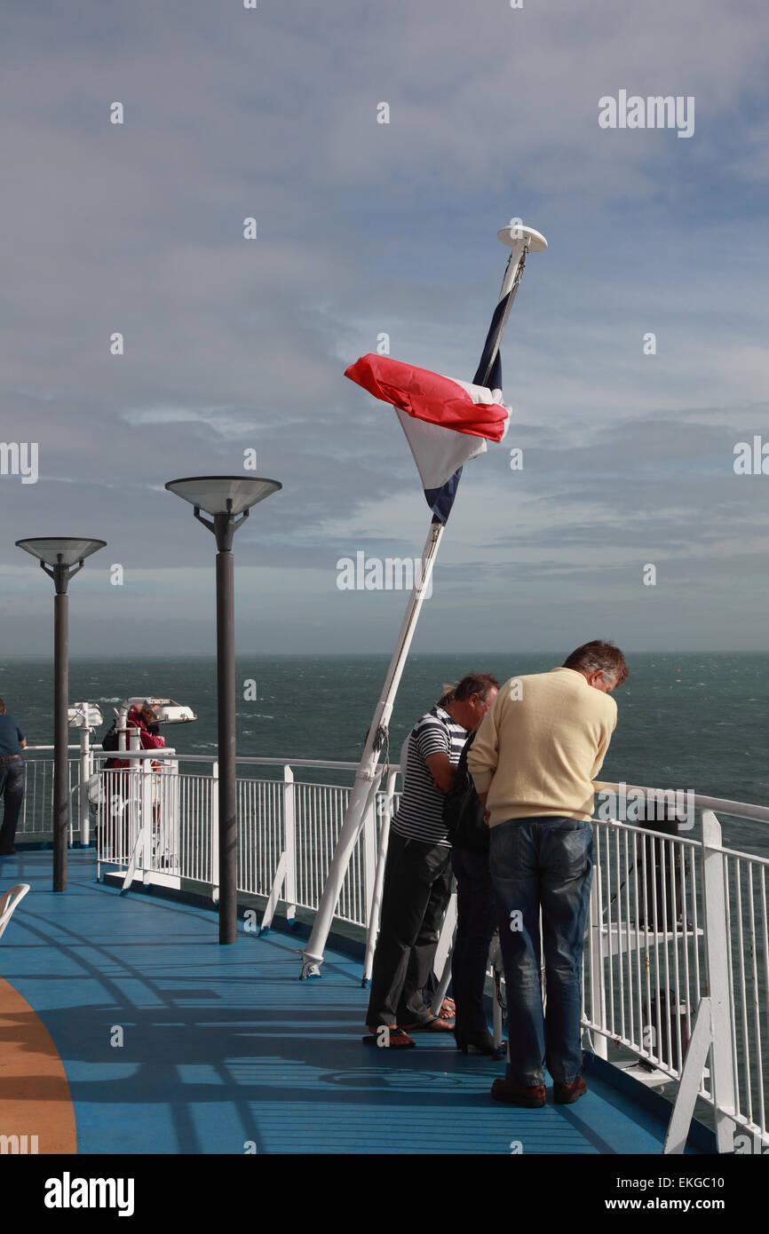 Passengers looking over the side of Brittany ferry Cap Finistere in the ...