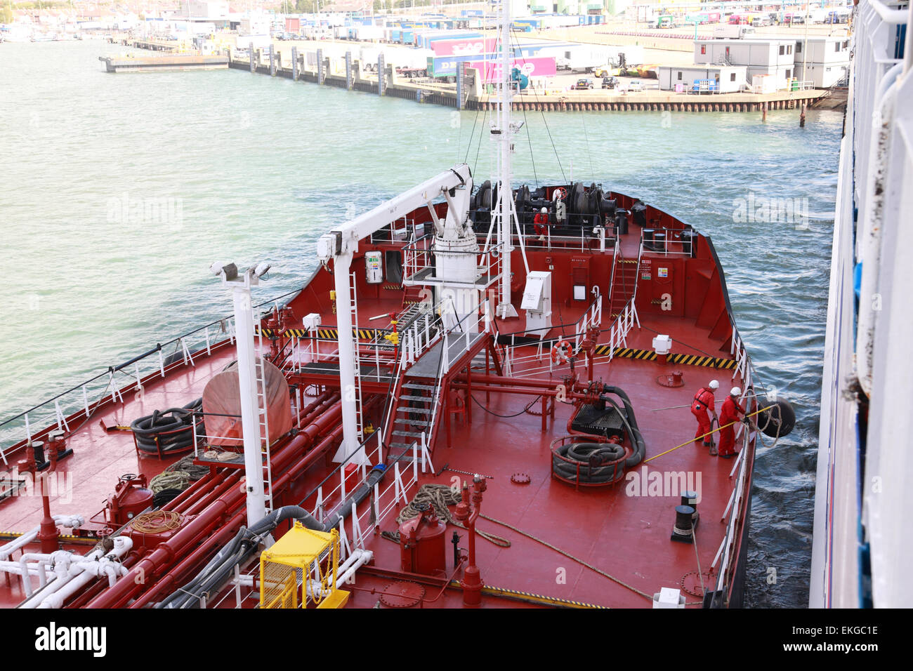 A Whitaker fuel bunkering ship next to the Brittany ferry Cap Finistere ...