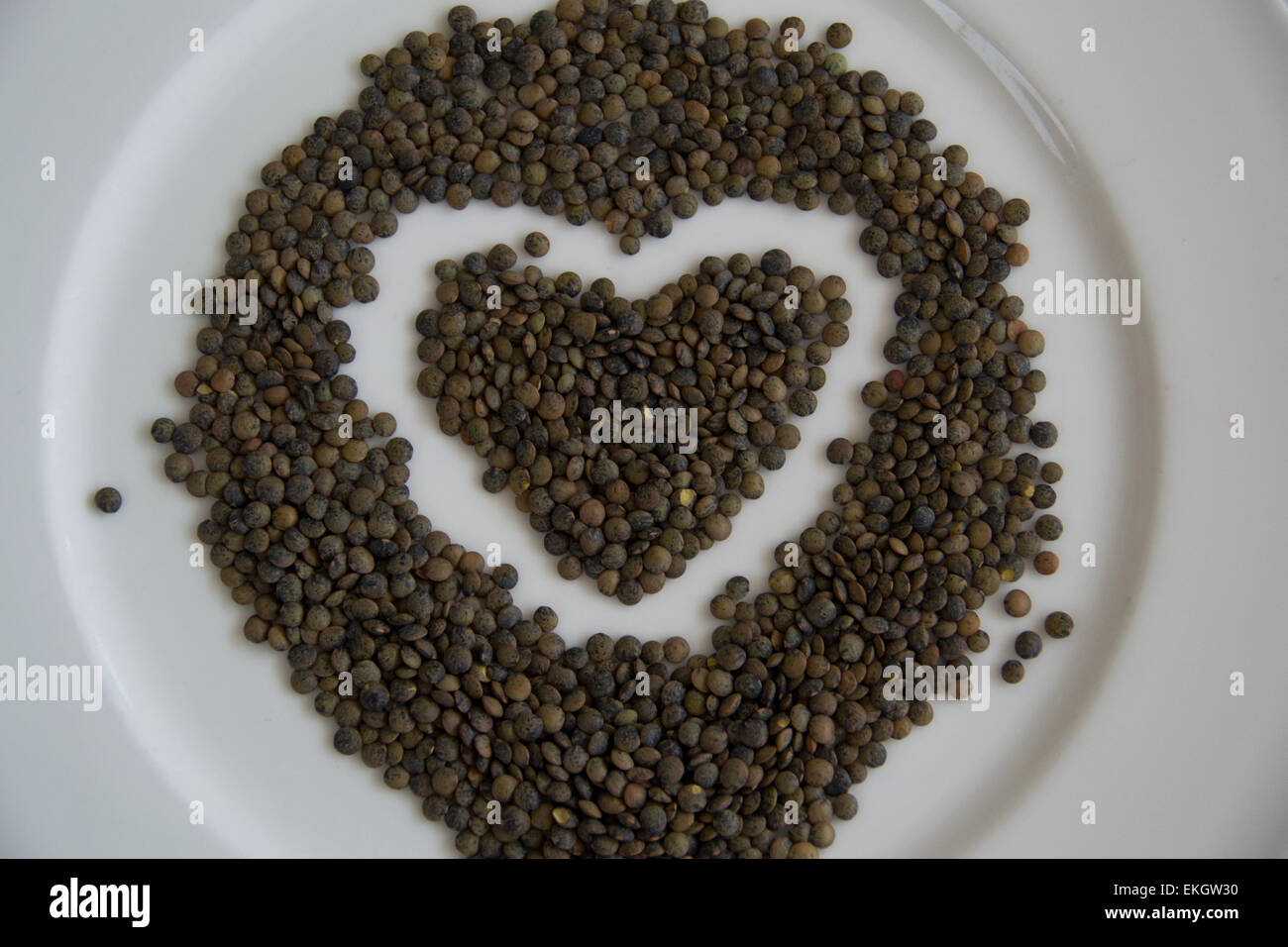 lentil heart, lentil plate Stock Photo - Alamy