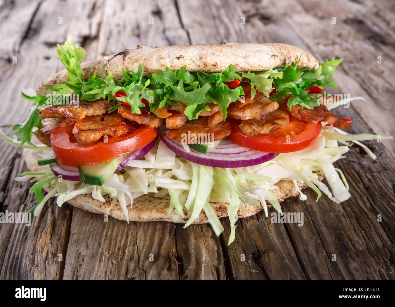 Doner Kebab - grilled meat, bread and vegetables Stock Photo - Alamy
