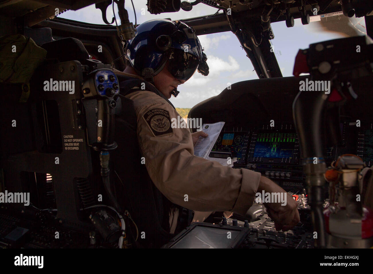 CBP’s Office of Air and Marine pilots fly a UH-60 Black Hawk helicopter ...