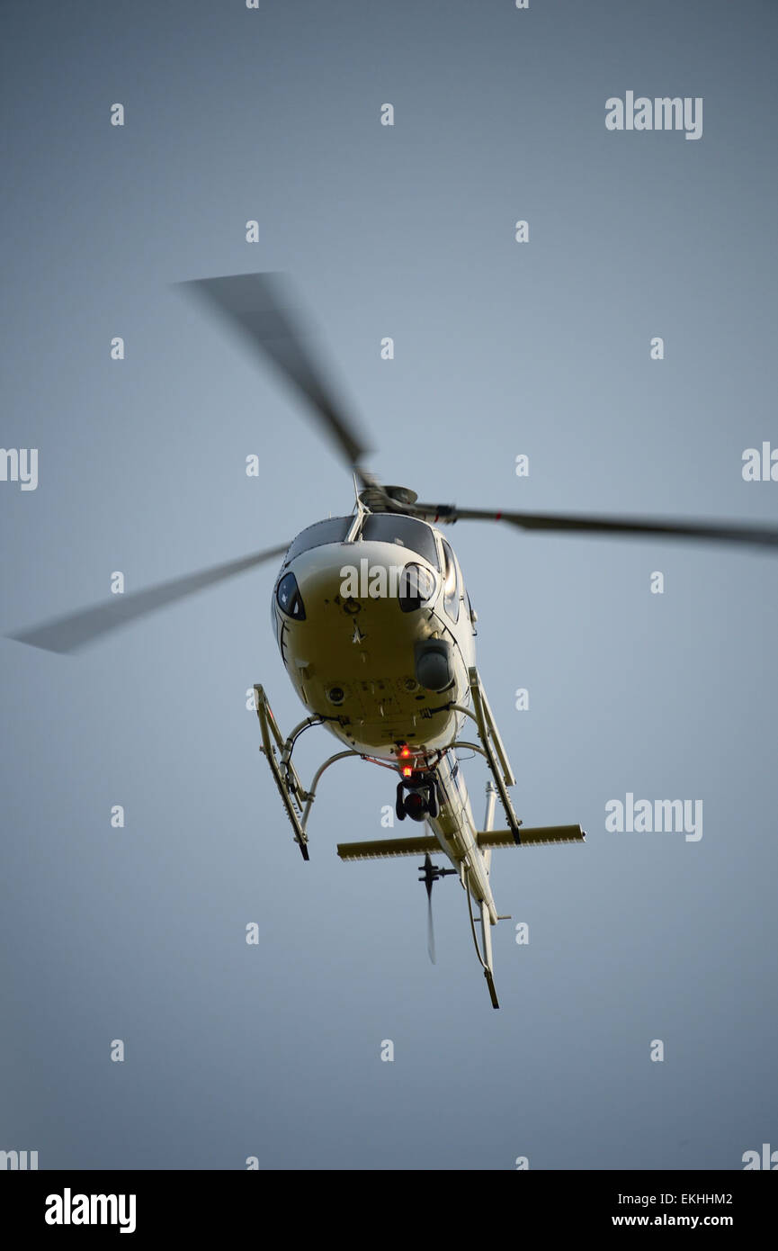 A CBP Border Patrol canine officer conducts a vehicle inspection at a U ...