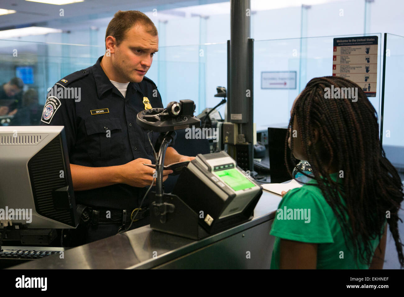 CBP officers process passengers arriving in the United States, ensuring ...
