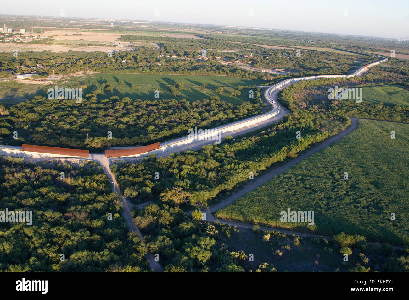 An aerial view of the South Texas McAllen fenceline in the Rio Grande ...