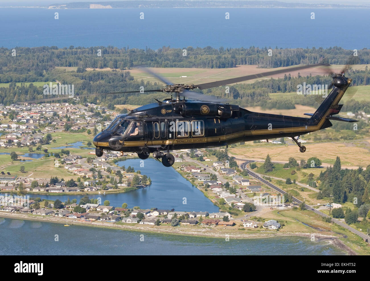 A Customs and Border Protection UH-60 Blackhawk conducts a patrol over ...
