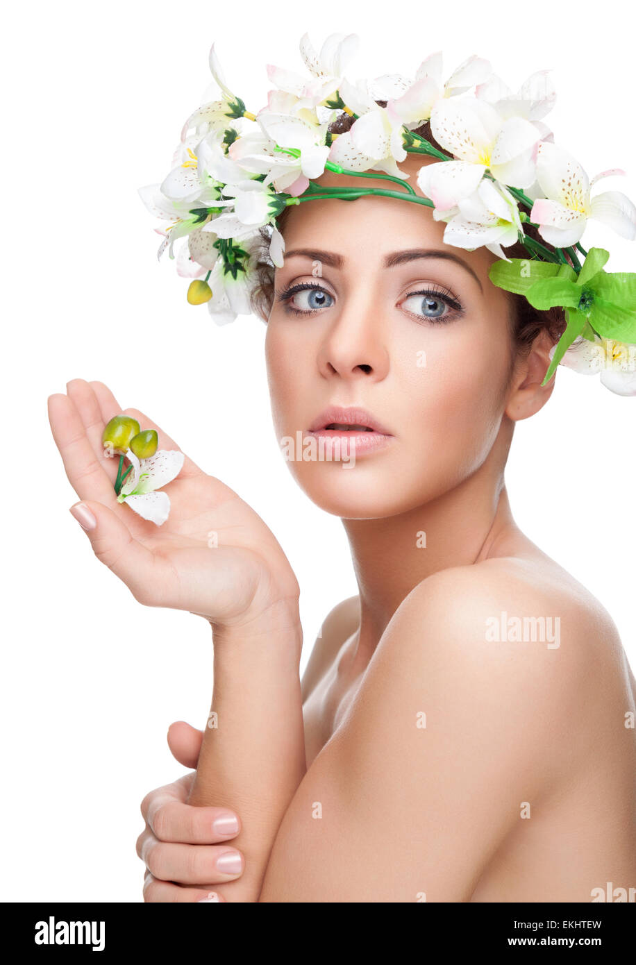 Beautiful young woman with a flower Stock Photo - Alamy