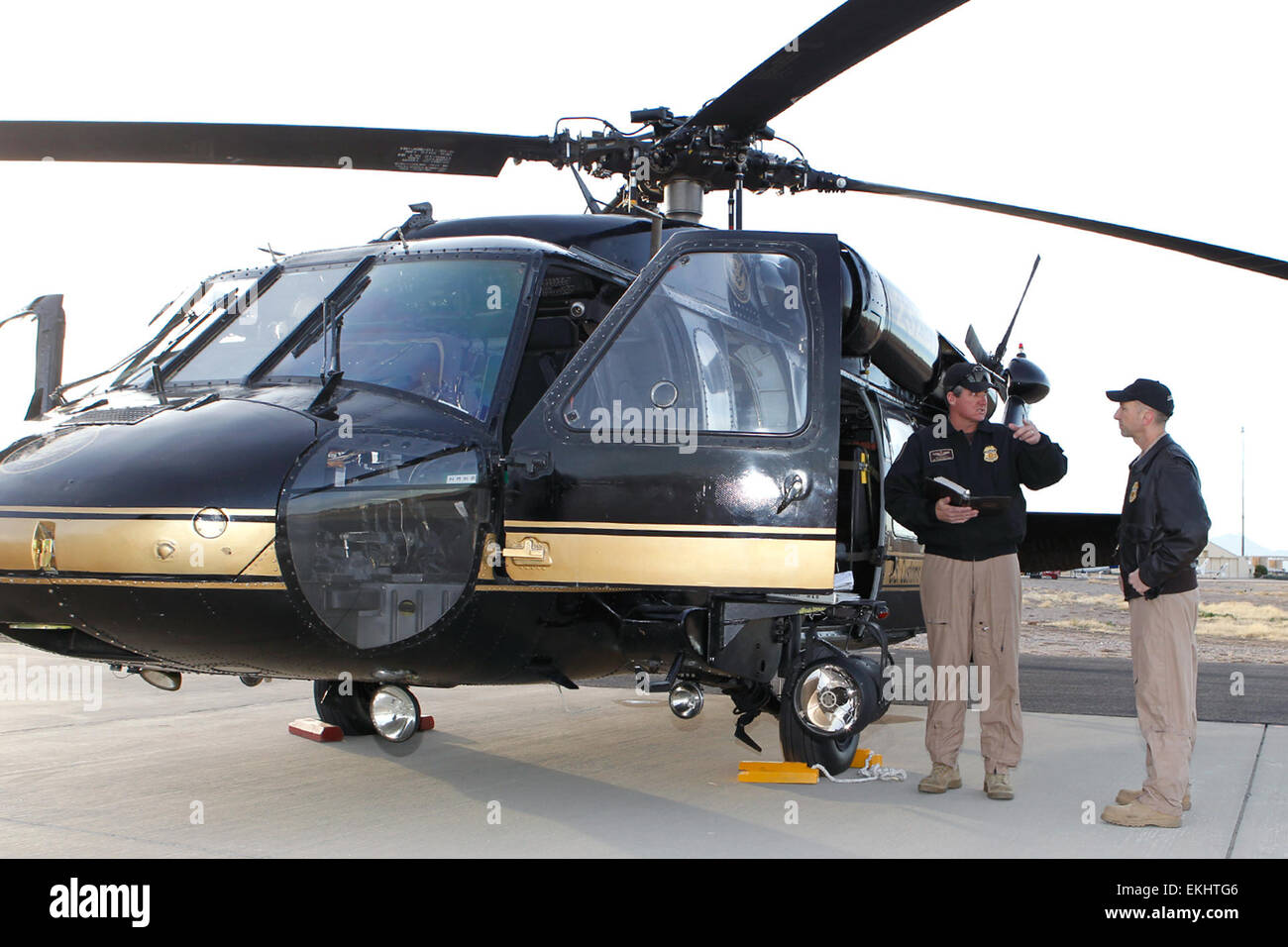 CBP pilots perform routine operational checks on a Blackhawk helicopter ...