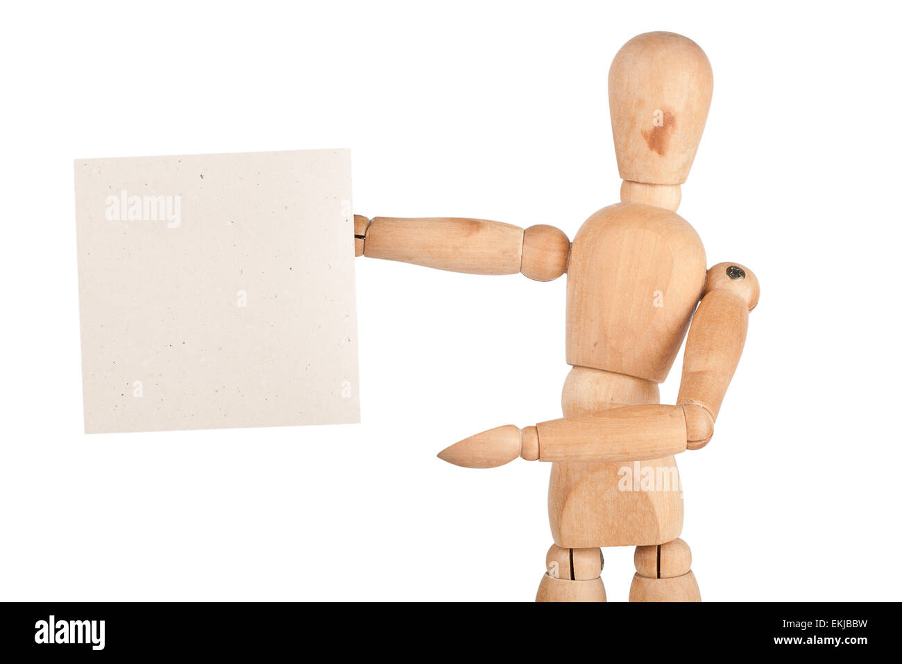 Wooden dummy holding handmade paper isolated on a white background ...