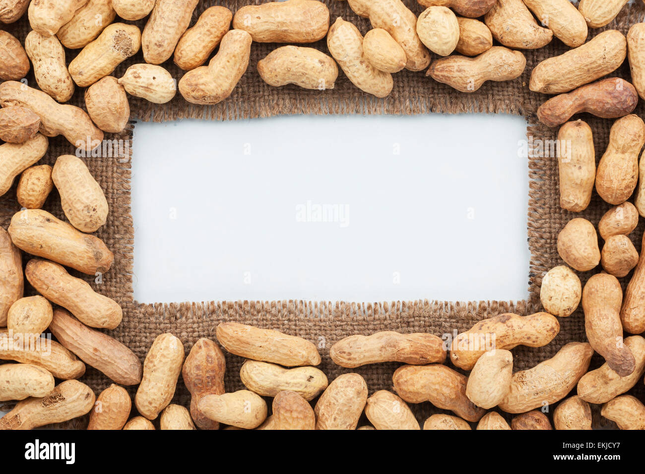 Frame made of burlap with dried peanut, on a white background Stock ...