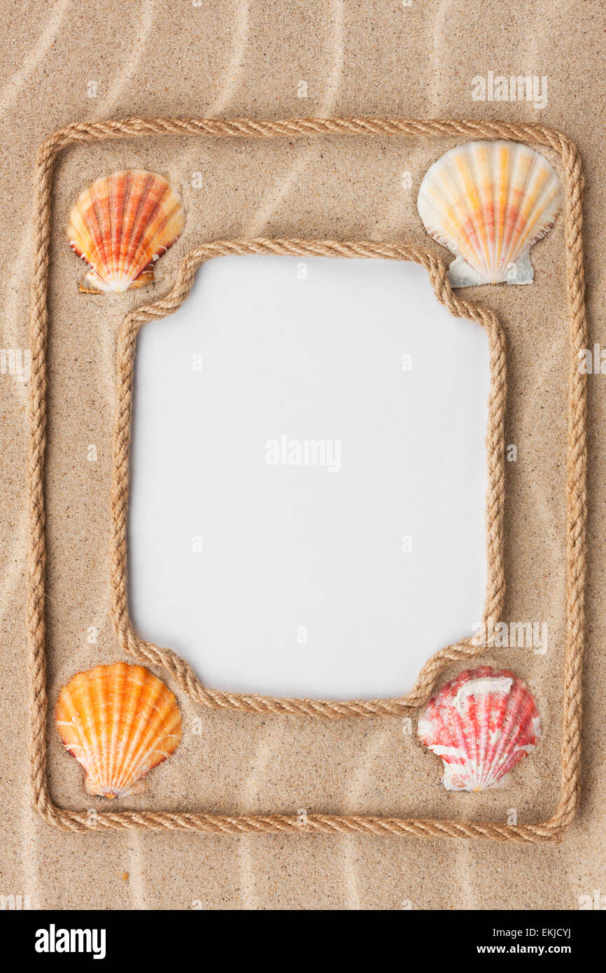 Two beautiful frame made of rope and sea shells with a white background ...