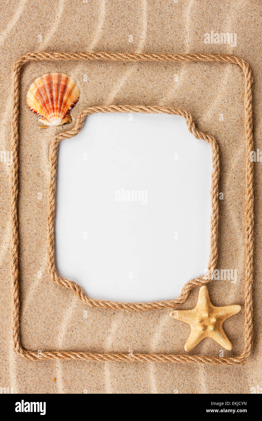 Two beautiful frame made of rope and sea shells with a white background ...