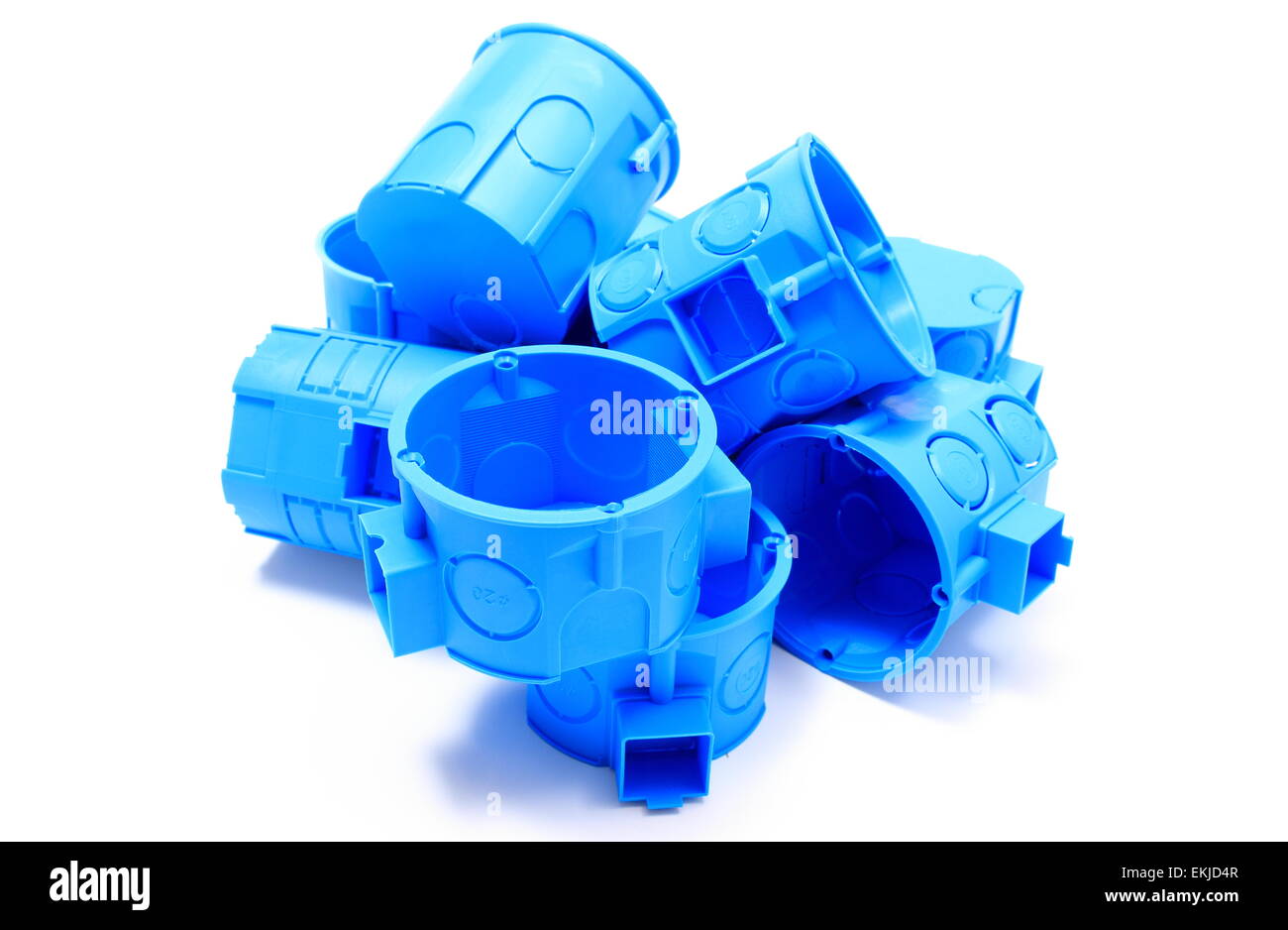 Heap of blue plastic electrical boxes on white background, junction ...