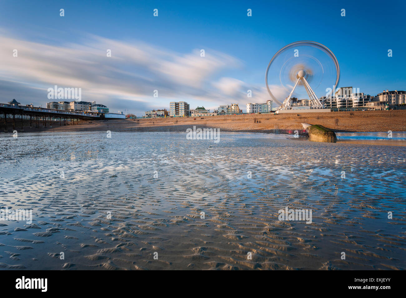 Brighton Wheel at low tide on a spring afternoon, East Sussex, England ...