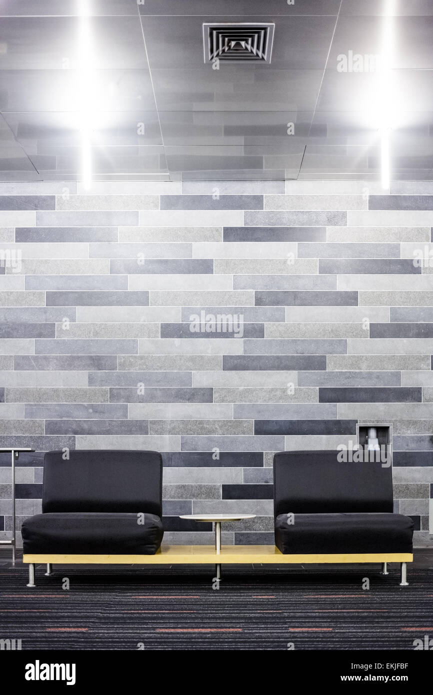 Very Modern Couch Setup in Front of a Gray Brick Wall Stock Photo - Alamy