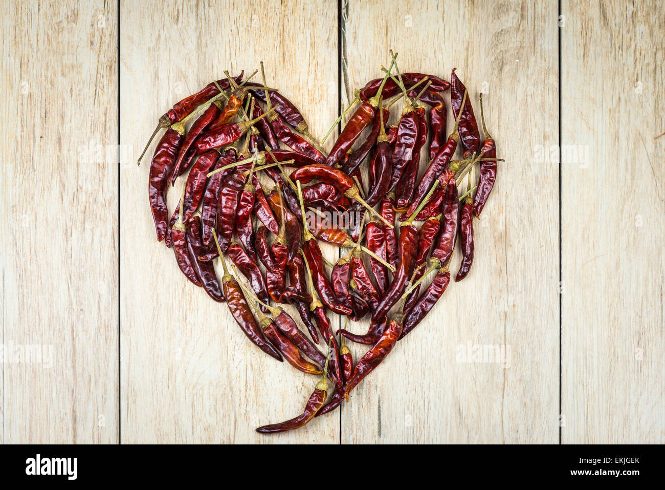 In the picture Italian chili peppers, arranged to form a red heart ...