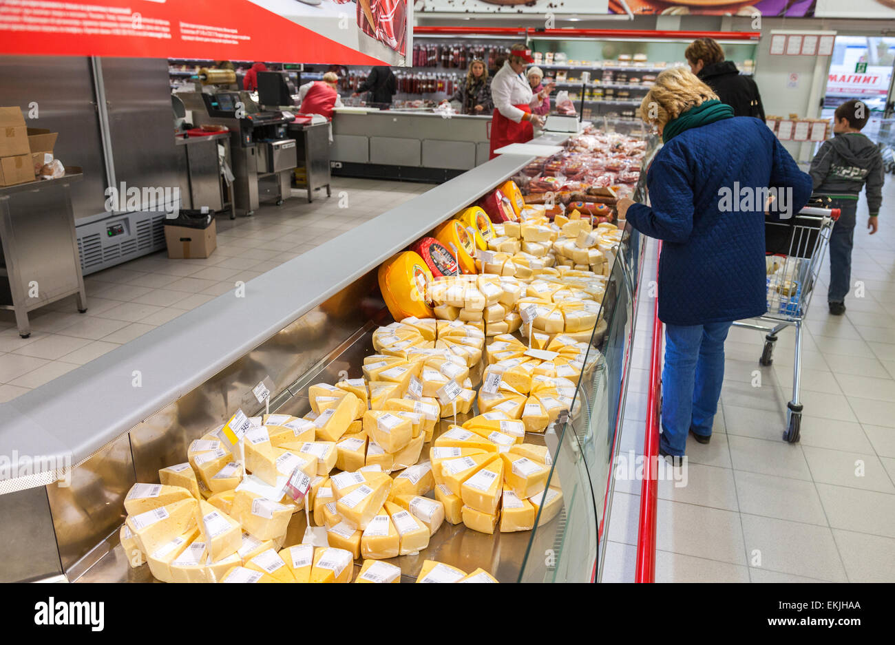 Showcase with cheese ready to sale in supermarket Magnit. Russia's ...