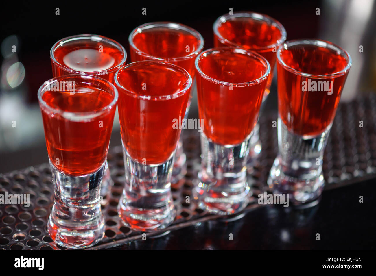 Barman makes shots in a bar Stock Photo - Alamy