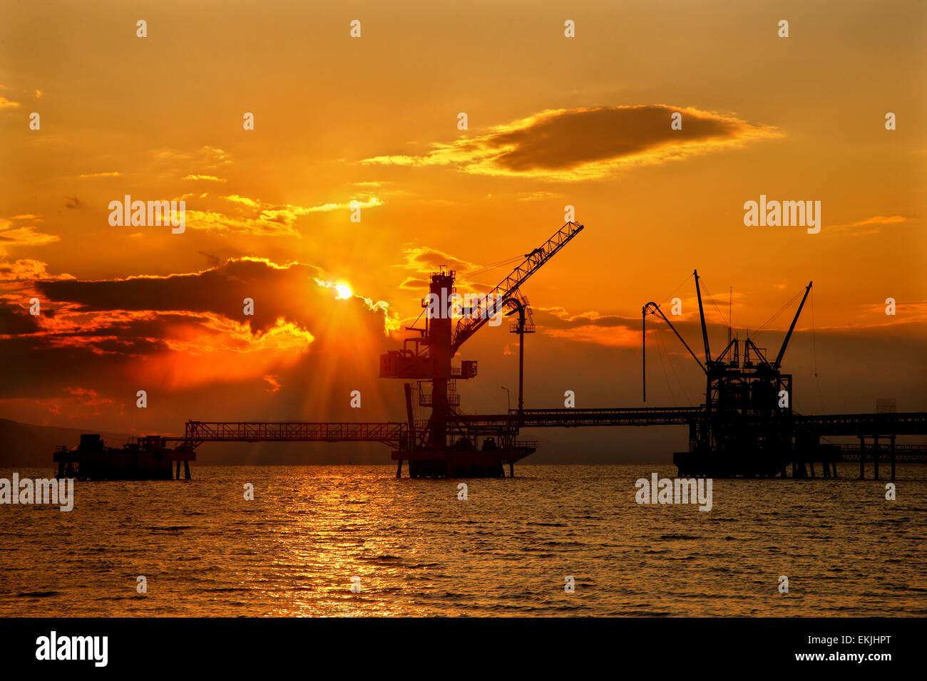 Sunset at the industrial area of Sogia, North Evoikos gulf ...