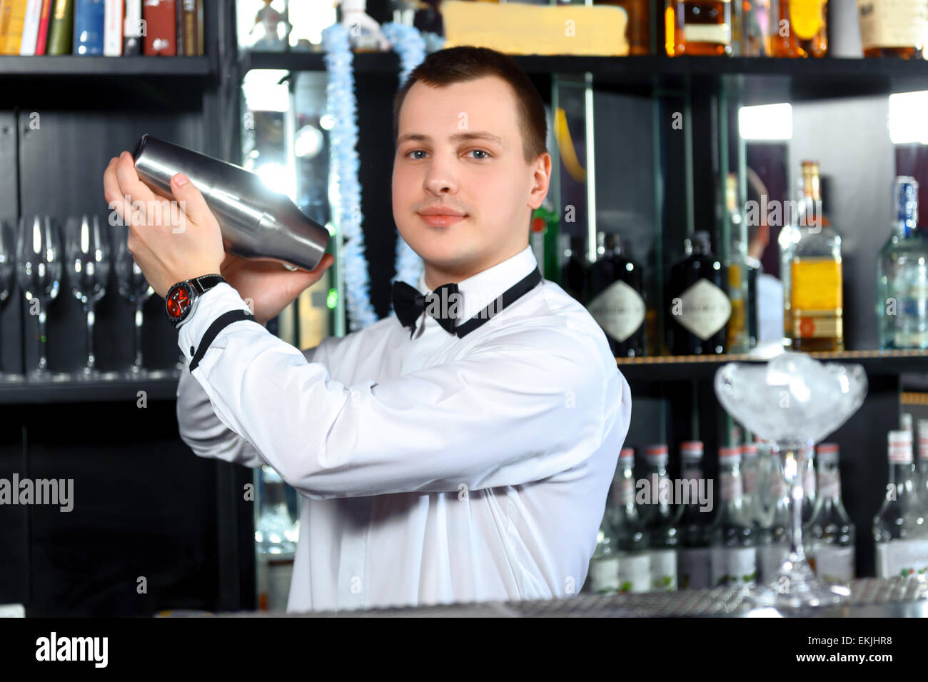 Barman makes tasty cocktails Stock Photo - Alamy
