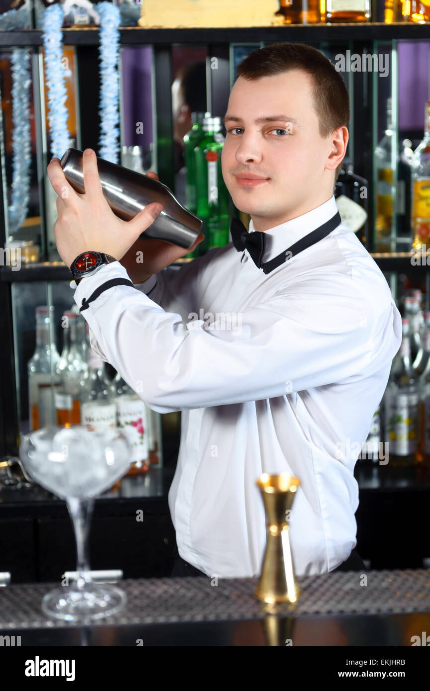 Barman makes tasty cocktails Stock Photo - Alamy