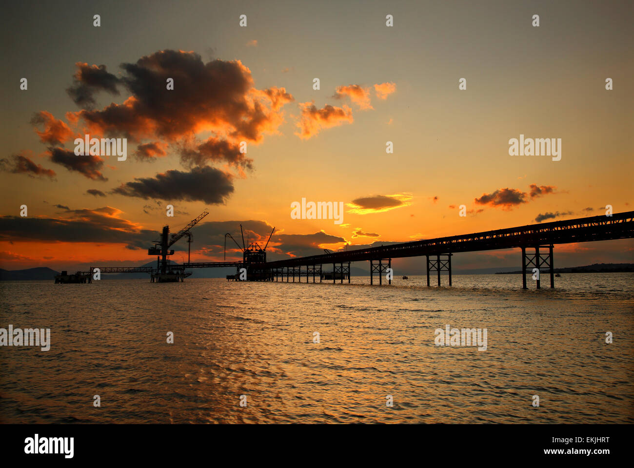 Sunset at the industrial area of Sogia, North Evoikos gulf ...