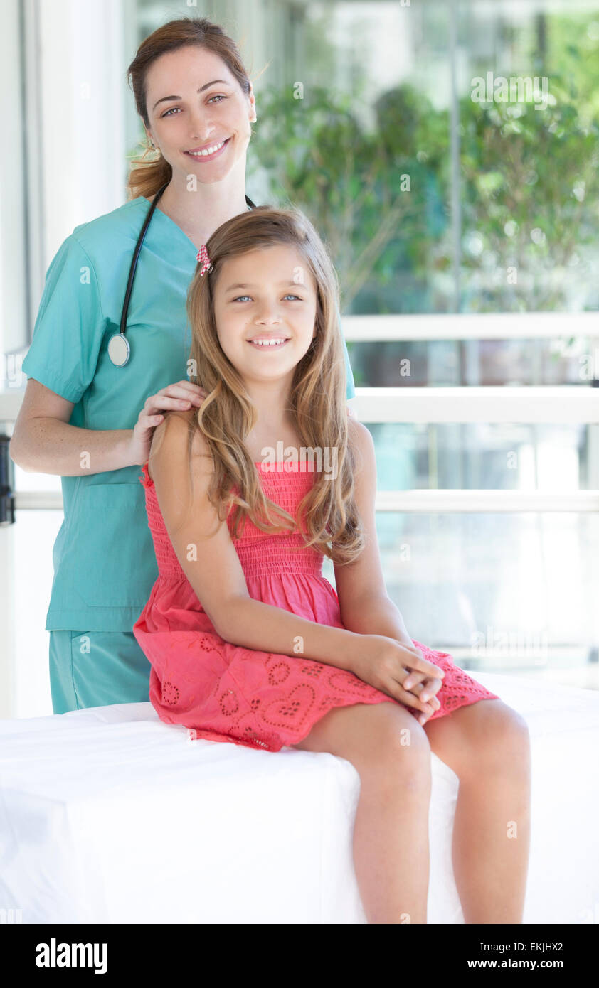 Pediatrician with her patient Stock Photo - Alamy