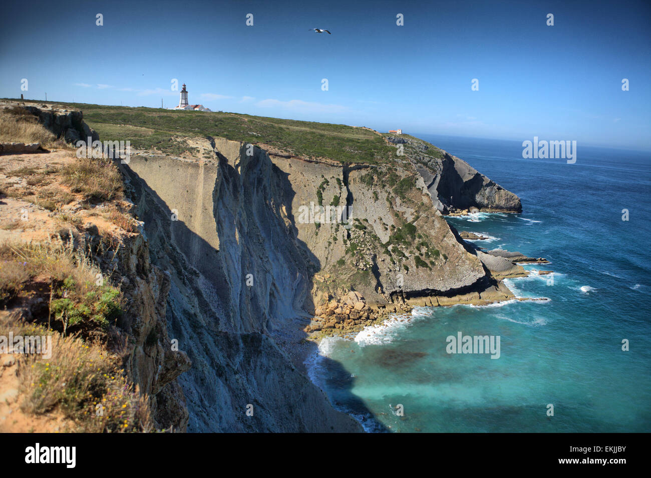 Espichel Cape lighthouse and cliff to the sea, Sesimbra, Portugal Stock Photo - Alamy